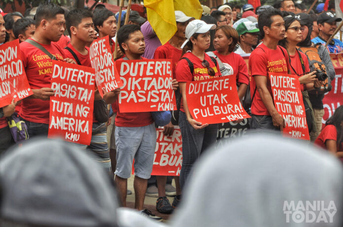IN PHOTOS: Progressives march against fascism on Bonifacio Day ...
