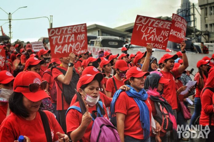 IN PHOTOS: Progressives march against fascism on Bonifacio Day ...