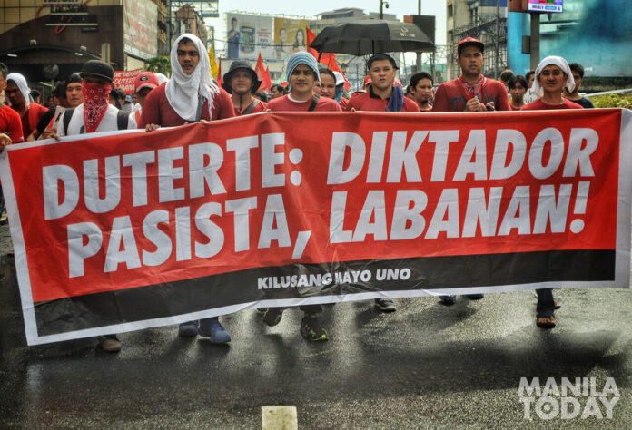 IN PHOTOS: Progressives march against fascism on Bonifacio Day ...